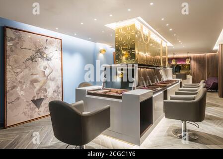Haircut stations in a luxury hair salon between ground floor and ...