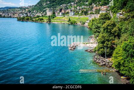 People swim in the lake of Geneva, during the "Fete des Baigneurs ...