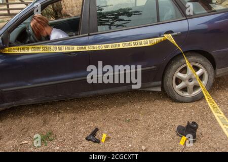 Female homicide detective at the scene of a body being discovered ...