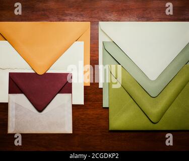 Colorful paper envelopes on light background Stock Photo - Alamy