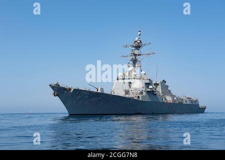 USS Sterett (DDG 104) steams in formation while participating in ...