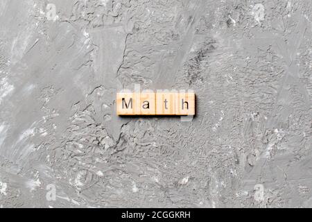 math word written on wood block. math text on table, concept Stock ...