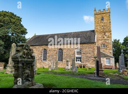 Tranent Parish Church, built 1800, and old graveyard on a sunny day ...