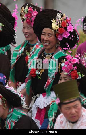 Achang women in traditional costume, at a village dance competition ...