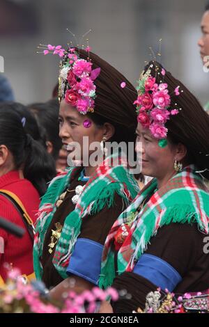 Achang women in traditional costume, at a village dance competition ...
