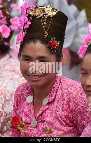 Achang women in traditional costume, at a village dance competition ...