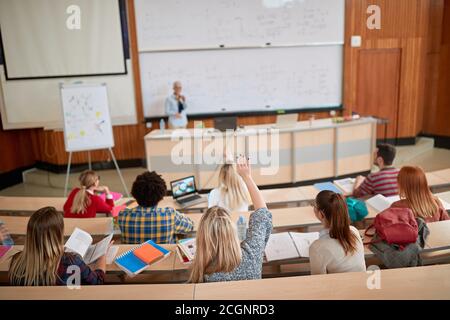 Lecturer and students in a university amphitheatre classroom Stock ...