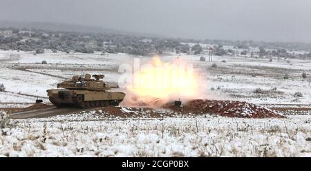An M1A2 Abrams tank crew from Company B, 3rd Battalion, 8th Cavalry ...