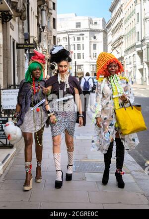 Models in designer stylish outfits on the runway of a fashion show ...