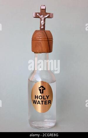 Bottle of holy water to bless Stock Photo - Alamy