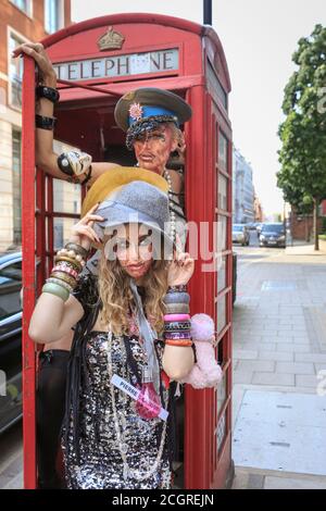 Mayfair, London, UK, 22 Jun 2019. Models pose in an extravagant ...