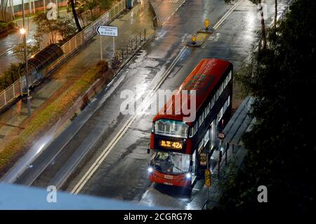Kowloon Motor Bus (KMB) bus stop and monthly pass advertisement, Lai ...