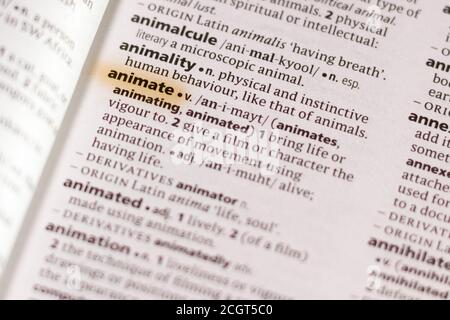 The word or phrase Animate in a dictionary highlighted with marker ...