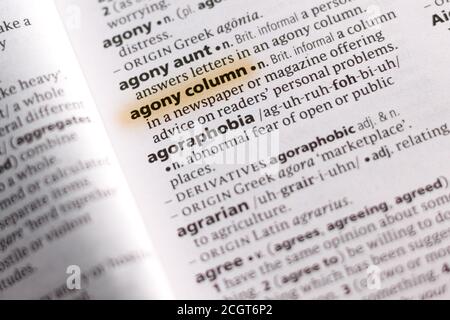 The word or phrase Agony in a dictionary highlighted with marker Stock ...