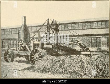 Field tile plow machine in farm field. Water drainage, soil ...