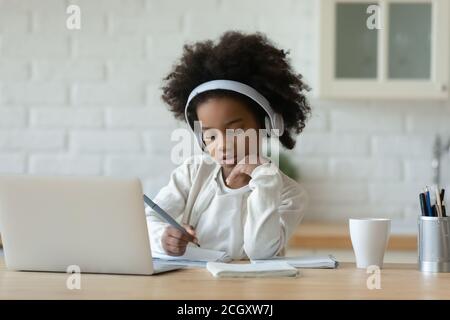 Little child remotely learn online with car toy before sent code, Asian ...