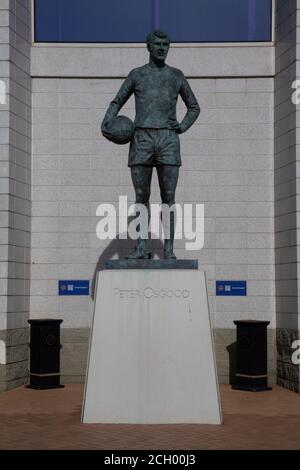 Statue of Peter Osgood outside the west stand at Chelsea Football Club ...