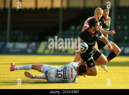 Exeter Chiefs' Harvey Skinner (left) and Leicester Tigers' Adam Radwan ...