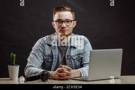 serious handsome ginger employee at workplace Stock Photo - Alamy