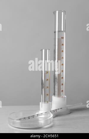 Different laboratory glassware on grey background, space for text Stock ...