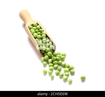Scoop with tasty fresh peas on white background Stock Photo - Alamy