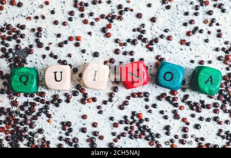 Word QUINOA with seeds on light background Stock Photo - Alamy