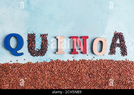 Word QUINOA with seeds on color background Stock Photo - Alamy