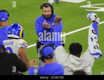 Los Angeles Rams head coach Sean McVay, front, talks to quarterback ...