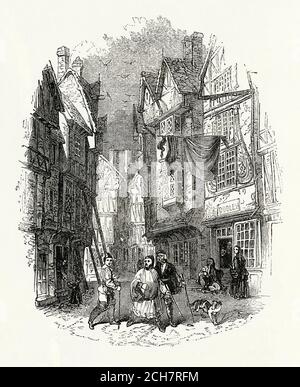 A medieval building housing shops in Lincoln High Street Stock Photo ...