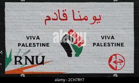 A pro Palestine mural in Belfast as Loyalist and Republican groups take ...