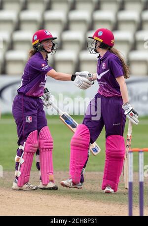 Lightning's Bethan Ellis and Sarah Bryce running between wickets ...