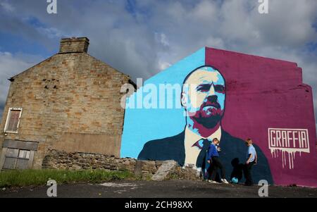 A mural of Burnley manager Sean Dyche on a gable end in Burnley Stock ...