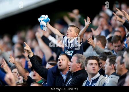 Millwall fans show their support in the stands Stock Photo - Alamy