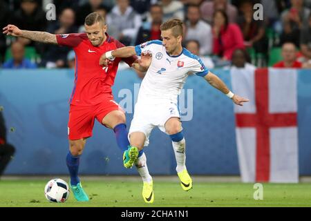England's Jack Wilshere and Slovakia's Peter Pekarik (right) battle for ...