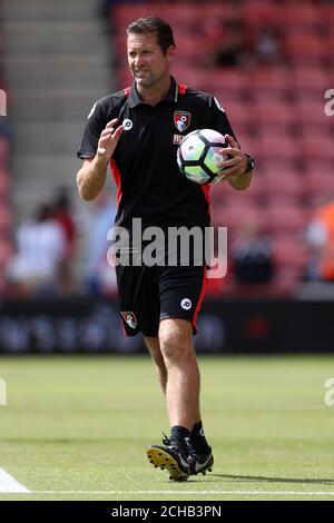 Bournemouth goalkeeping coach Neil Moss addresses officials at half ...