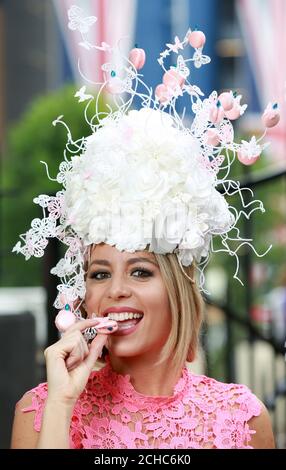 Model Carly Baker wears an edible hat commissioned by bookmakers Coral ...