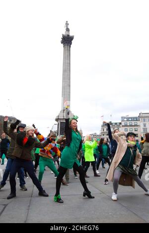 EDITORIAL USE ONLY A human shamrock formation created by over 200 ...