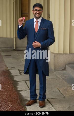 Saeed Atcha with his MBE medal, awarded to him during an investiture ...