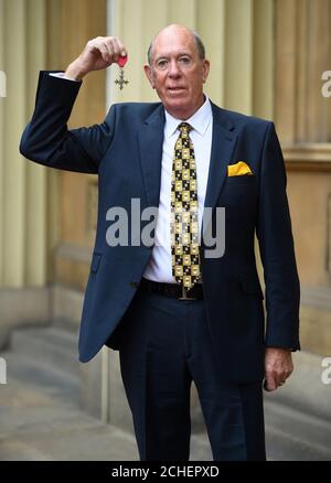 Darts player John Lowe with his MBE for services to Darts and to ...