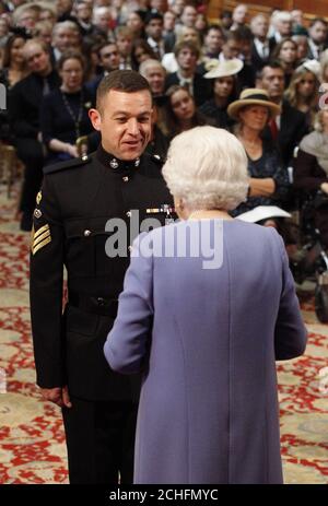 Staff Sergeant Stuart Griffiths is decorated with the Queen's Gallantry ...