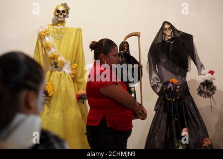 A figurine of Santa Muerte (Saint Death) seen outside the shrine in ...