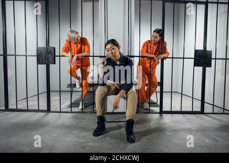 Asian women's prison. In the cell there are two young girls convicted ...