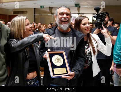 Tom Araya of Slayer and his wife Sandra Araya arrive at their midtown ...