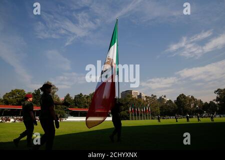 The Mexican military honor guard march in formation during a parade in ...
