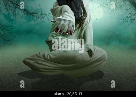 Scary ghost woman crawling with night scene background. Halloween ...