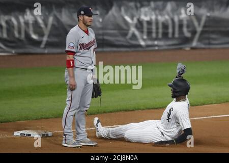 Minnesota Twins third baseman Josh Donaldson fields a ball at a ...