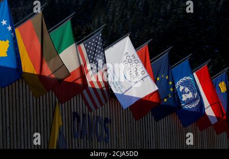 World Economic Forum, WEF, flag waving in the wind. Sky background 3D ...