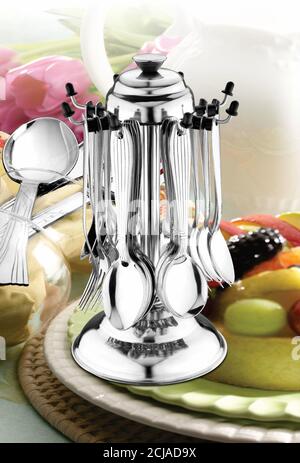 spoons, a Set of cutlery with stacked knifes, forks, spoons and tea ...