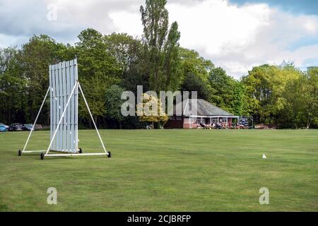 A sight screen at Wiseton Cricket Club with locals playing at the ...