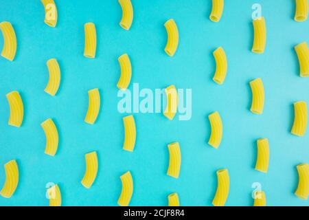 Macaroni pattern on blue background. Italian food. Pasta composition ...